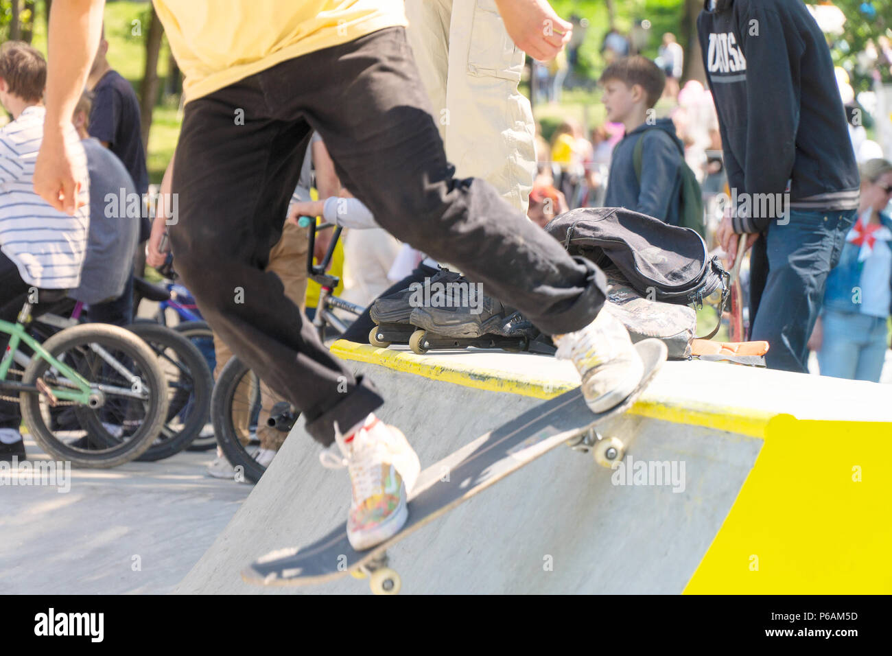 Skateboarder makes a jump in the skatepark Stock Photo - Alamy