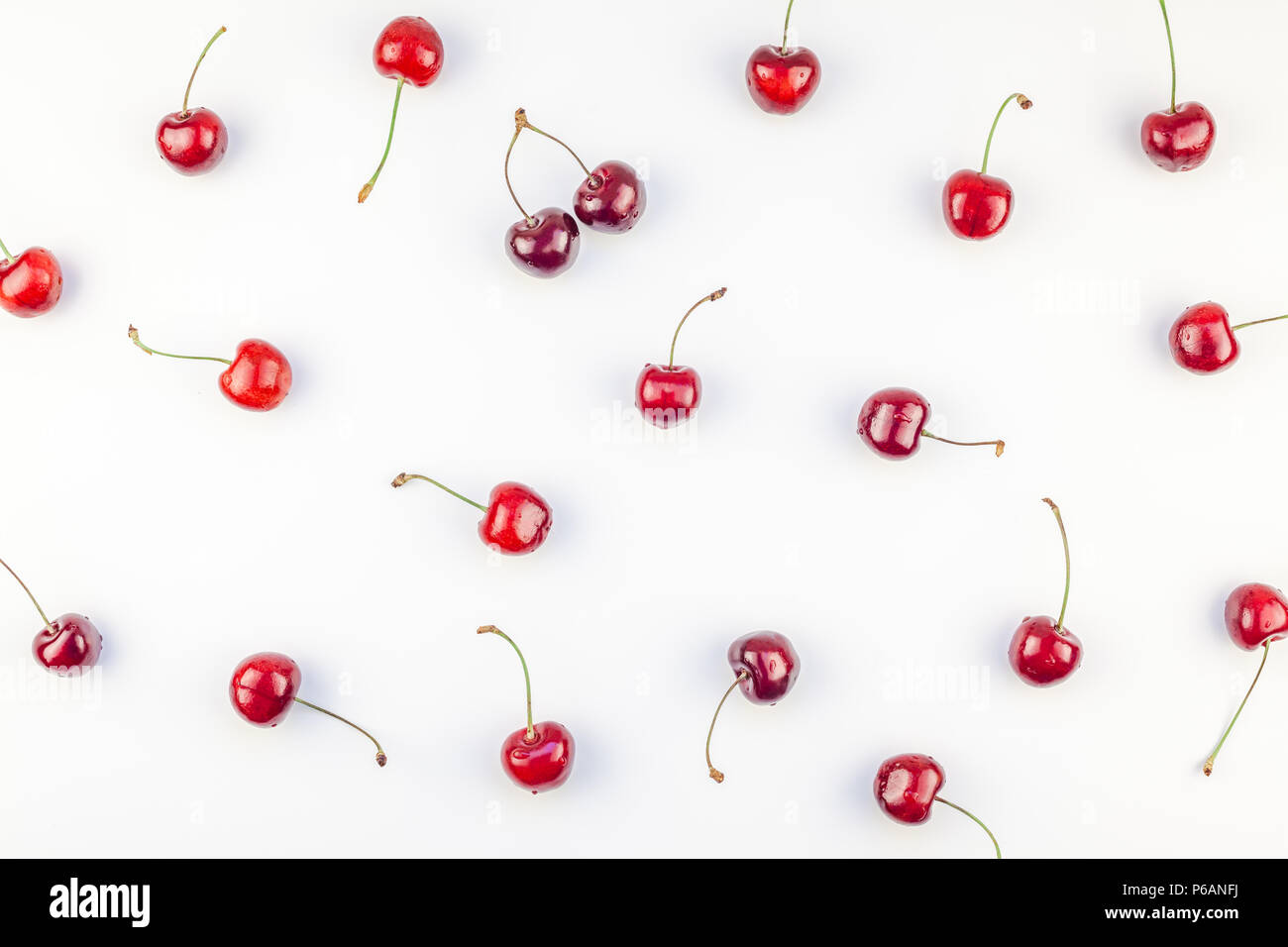 Creative top view of fresh ripe cherry pattern layout with copy space ...