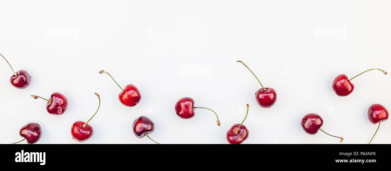 Long wide banner of fresh ripe cherry pattern layout with copy space ...