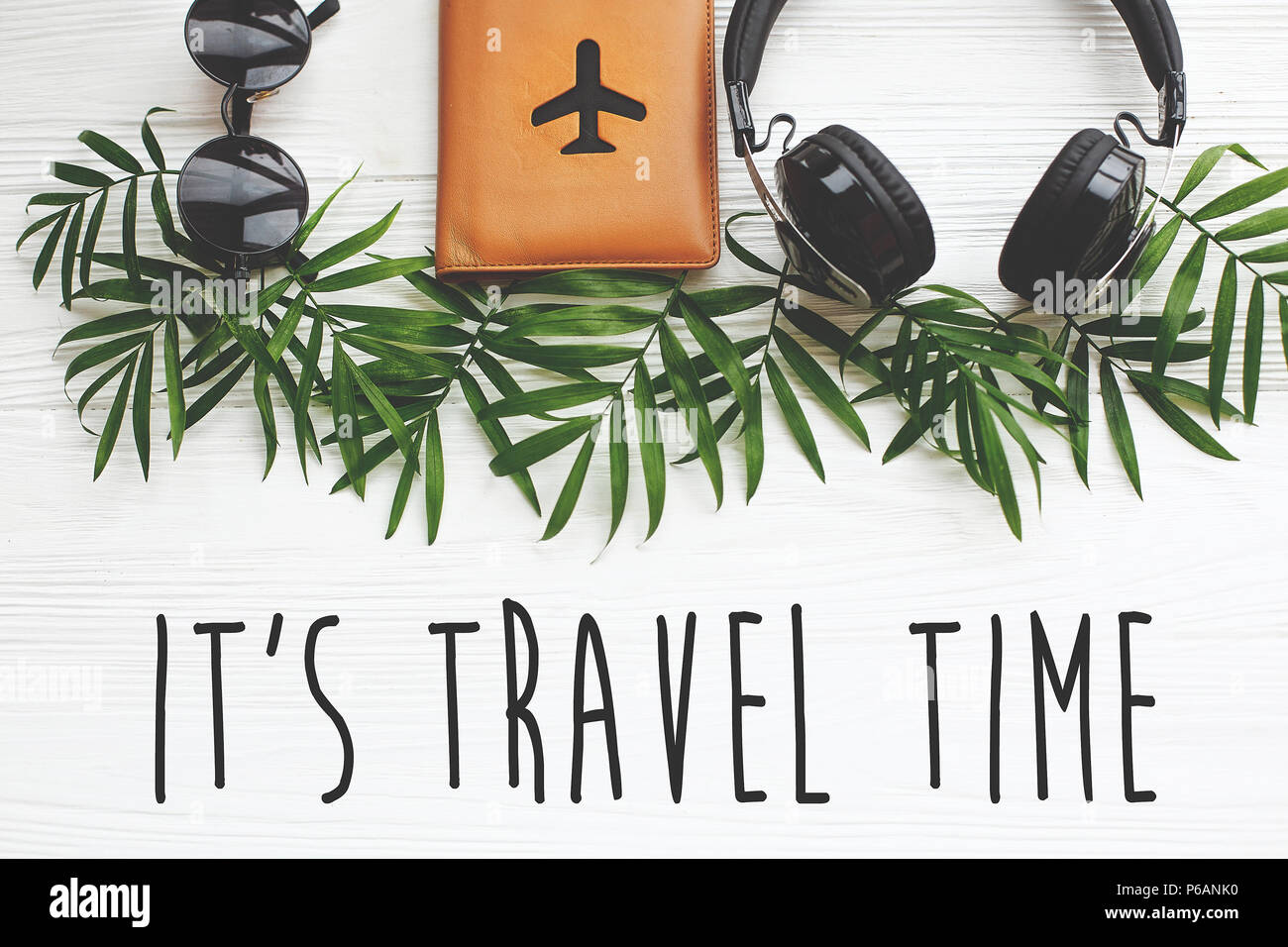 It's Travel Time text on passport with plane, retro sunglasses and ...