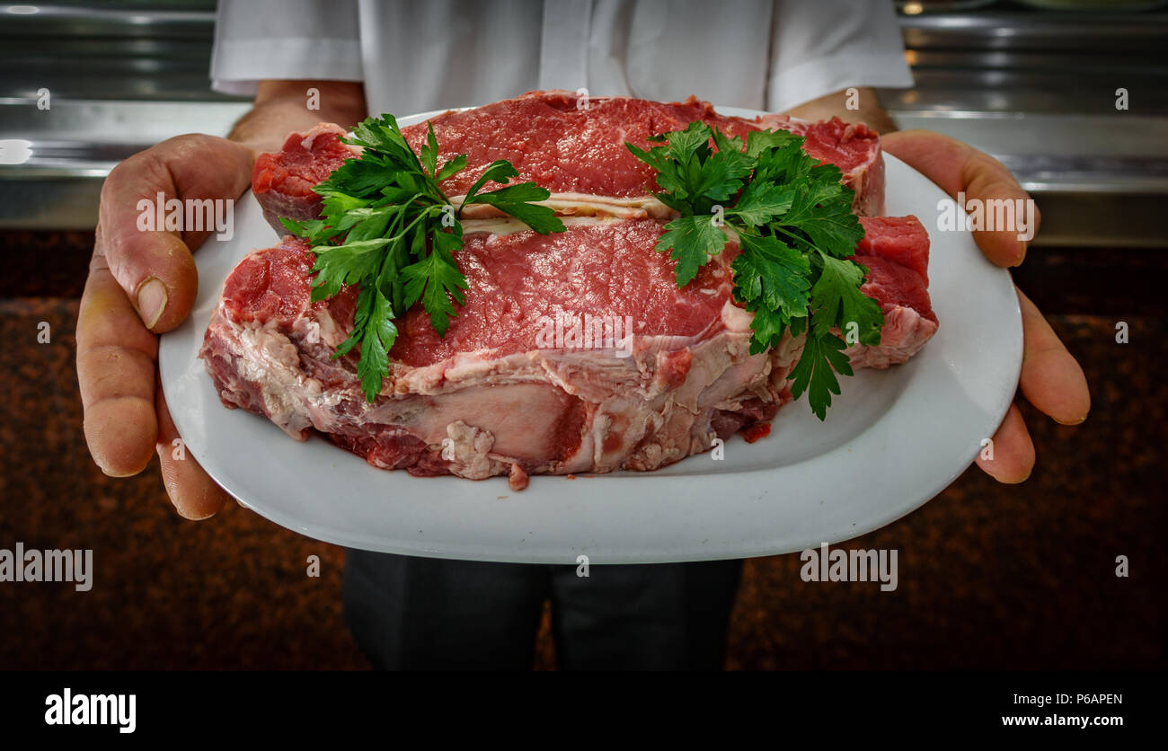 T-bone steak over plate Stock Photo - Alamy