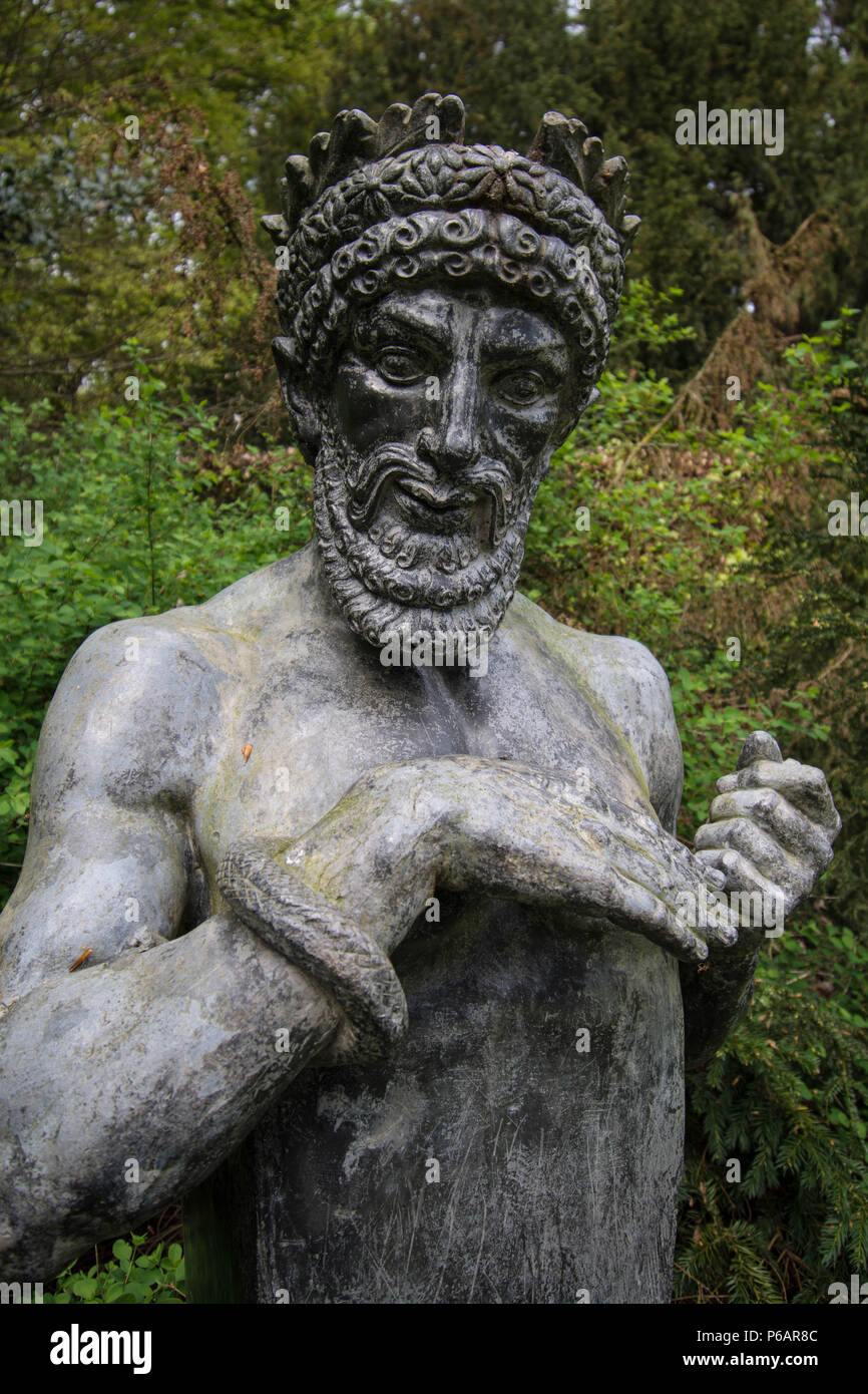Greek Statues in country house gardens Stock Photo - Alamy