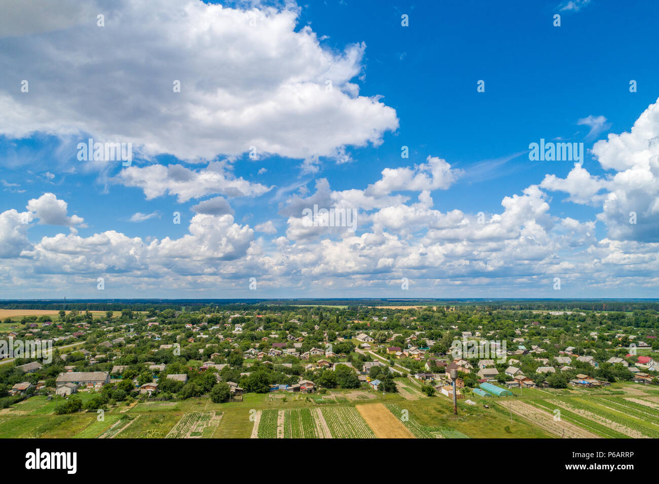 Aerial drone view of arable fields and plantation. Countryside, rural ...
