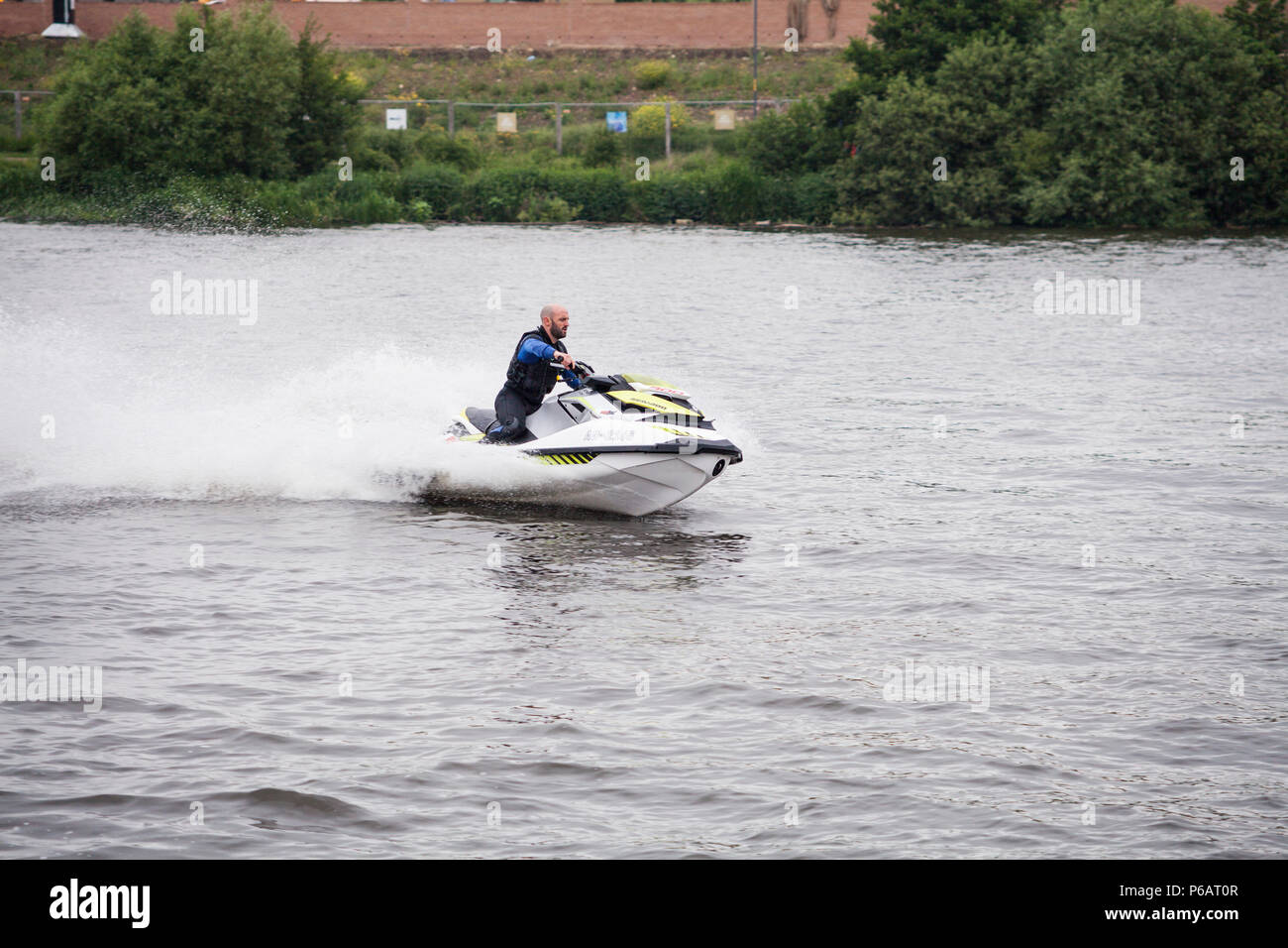 Man riding a jet ski hi-res stock photography and images - Alamy