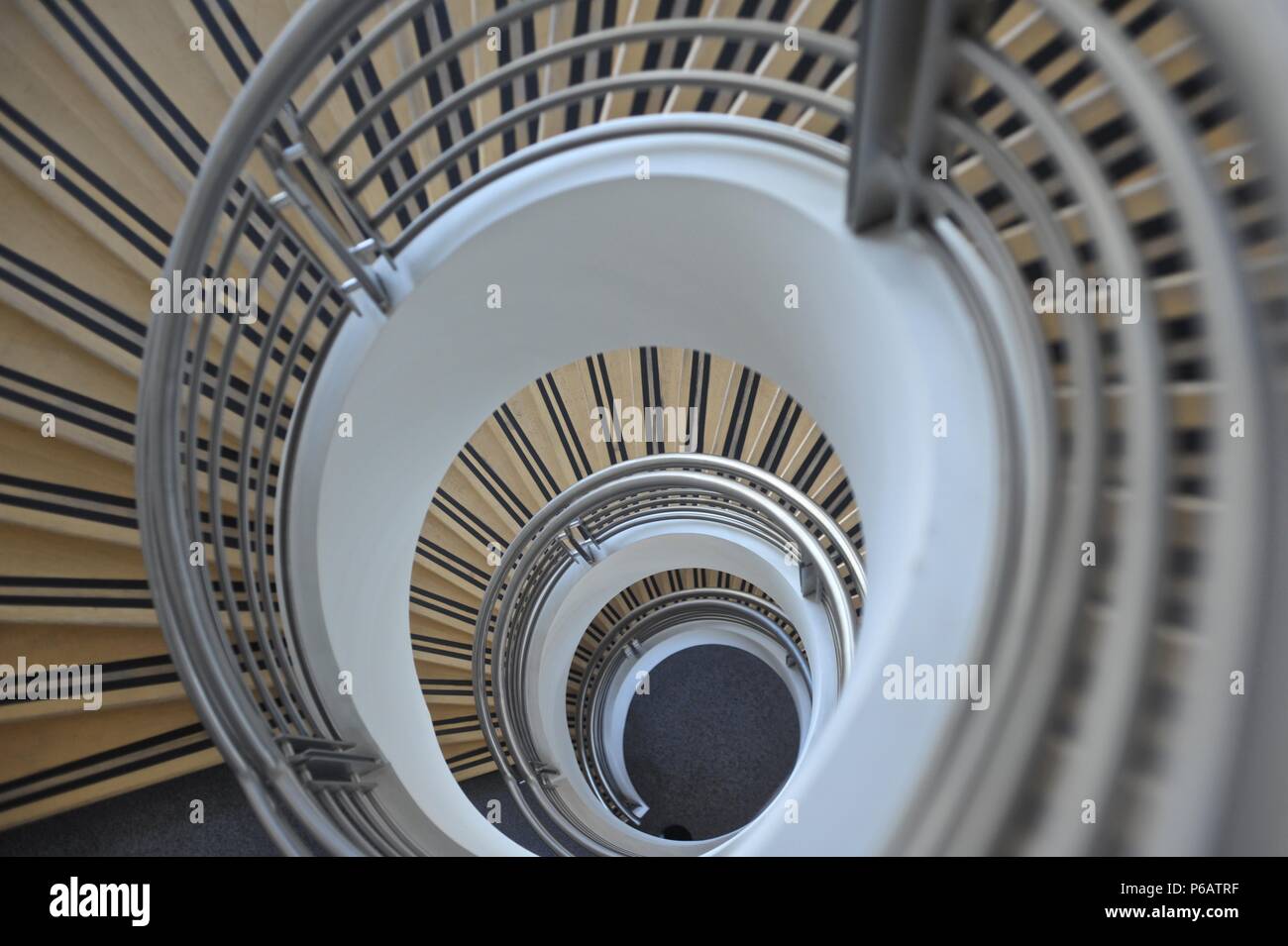Spiral Staircase in modern office building Stock Photo - Alamy