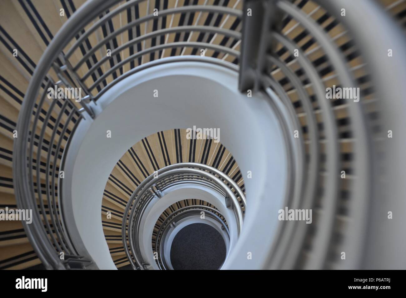 Spiral Staircase in modern office building Stock Photo - Alamy