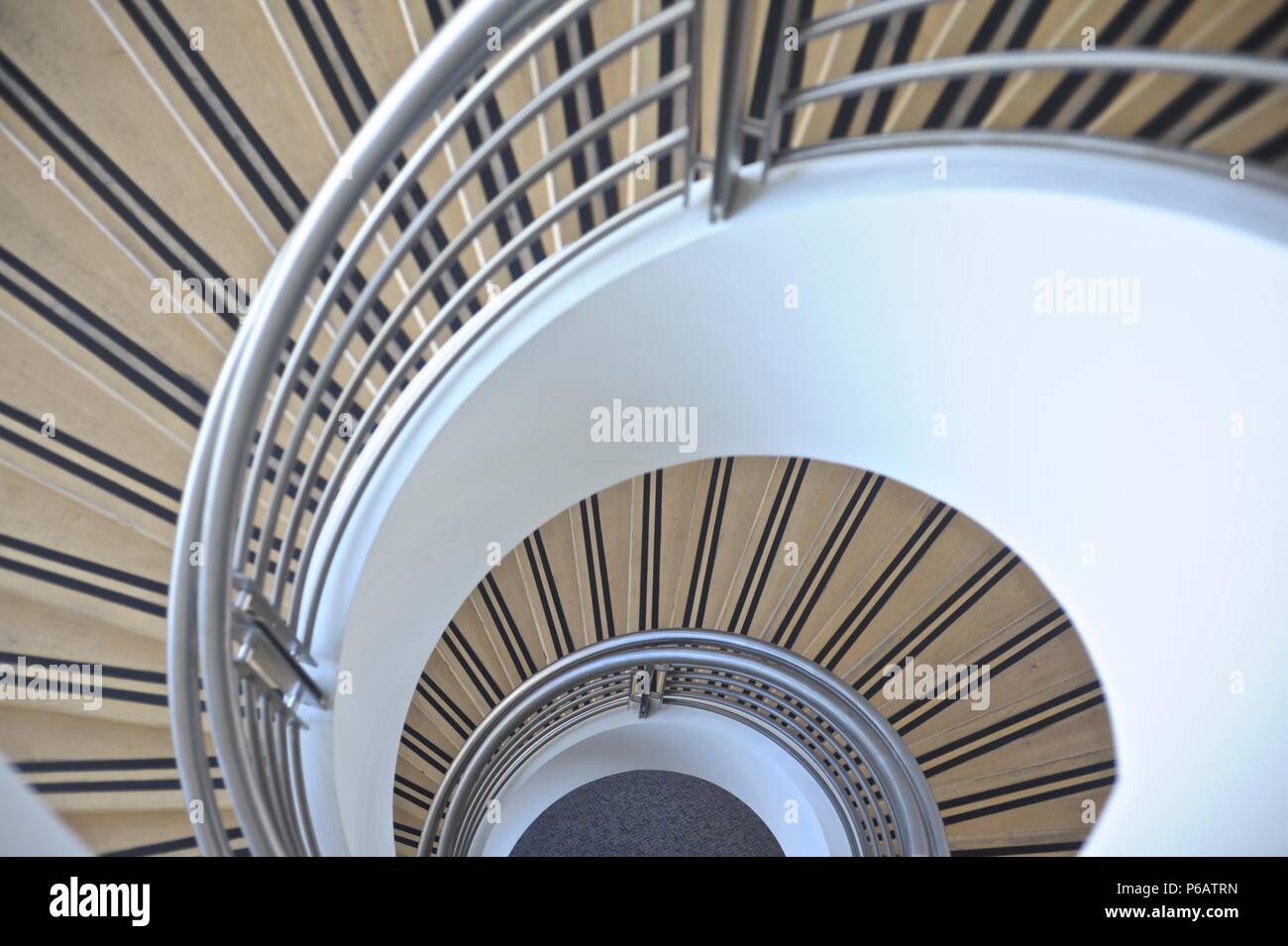 Spiral Staircase in modern office building Stock Photo - Alamy