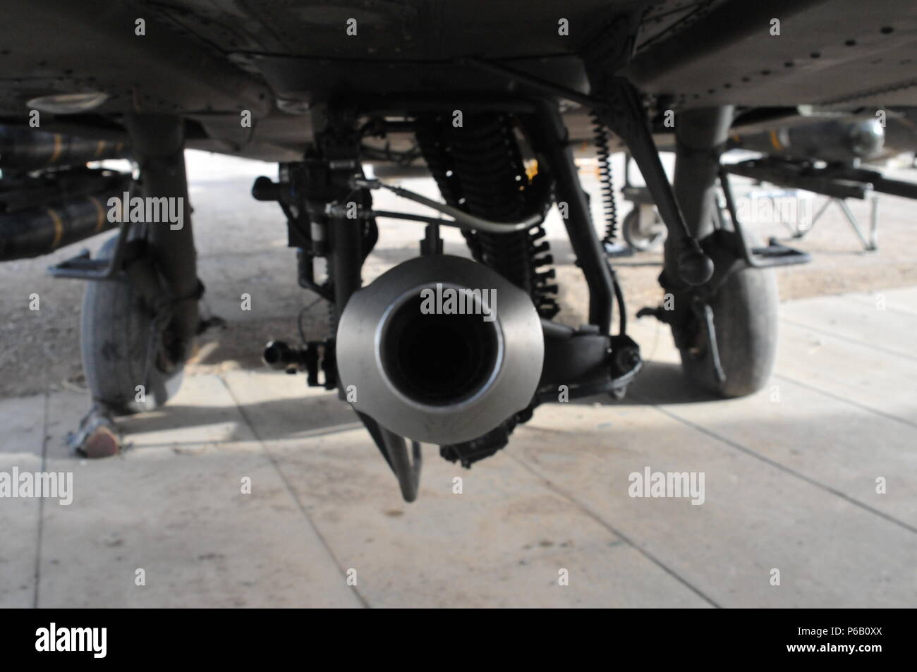An AH-64 Apache helicopter’s 30mm M230 chain gun sits loaded and on ...