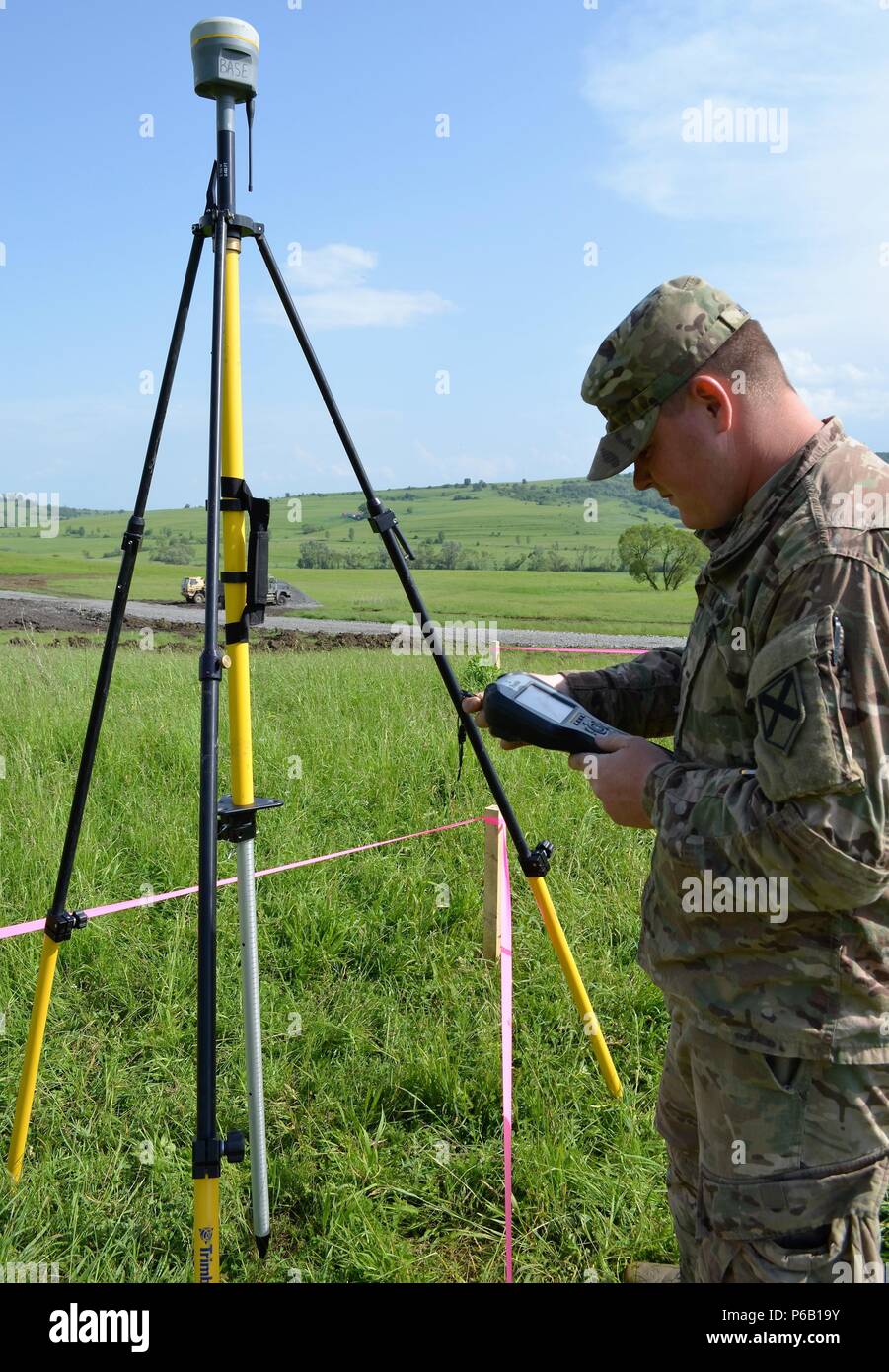 Spc. Riley Hughes, a survey and design supervisor with the 877th ...