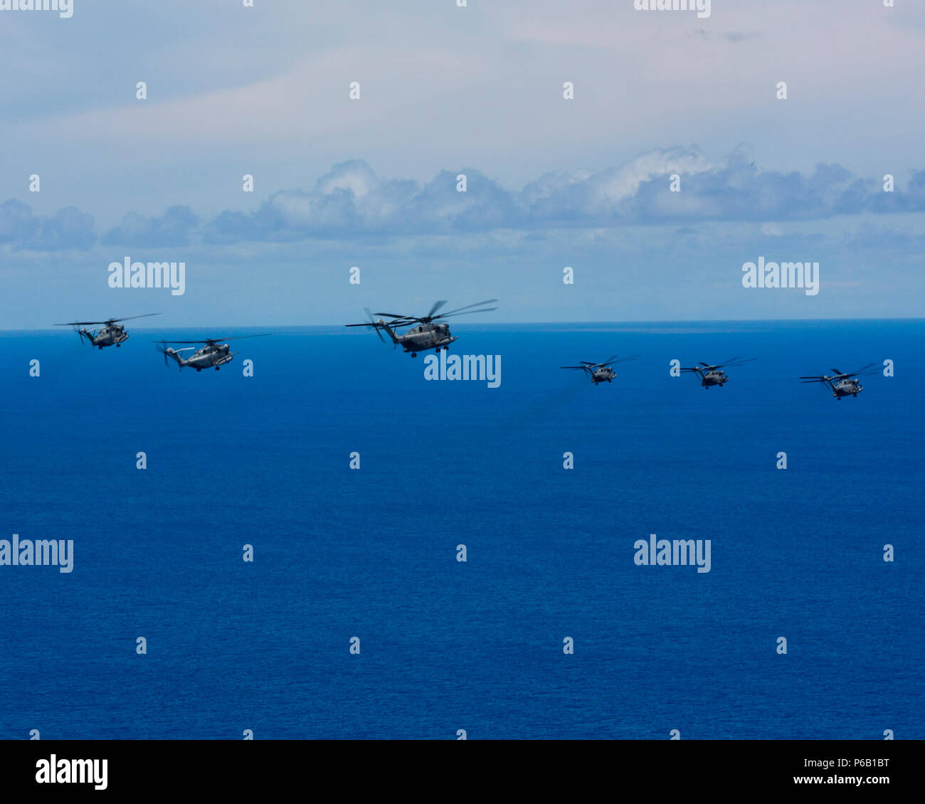 U.S. Marine Heavy Helicopter Squadron 463 (HMH-463) flies over the ...