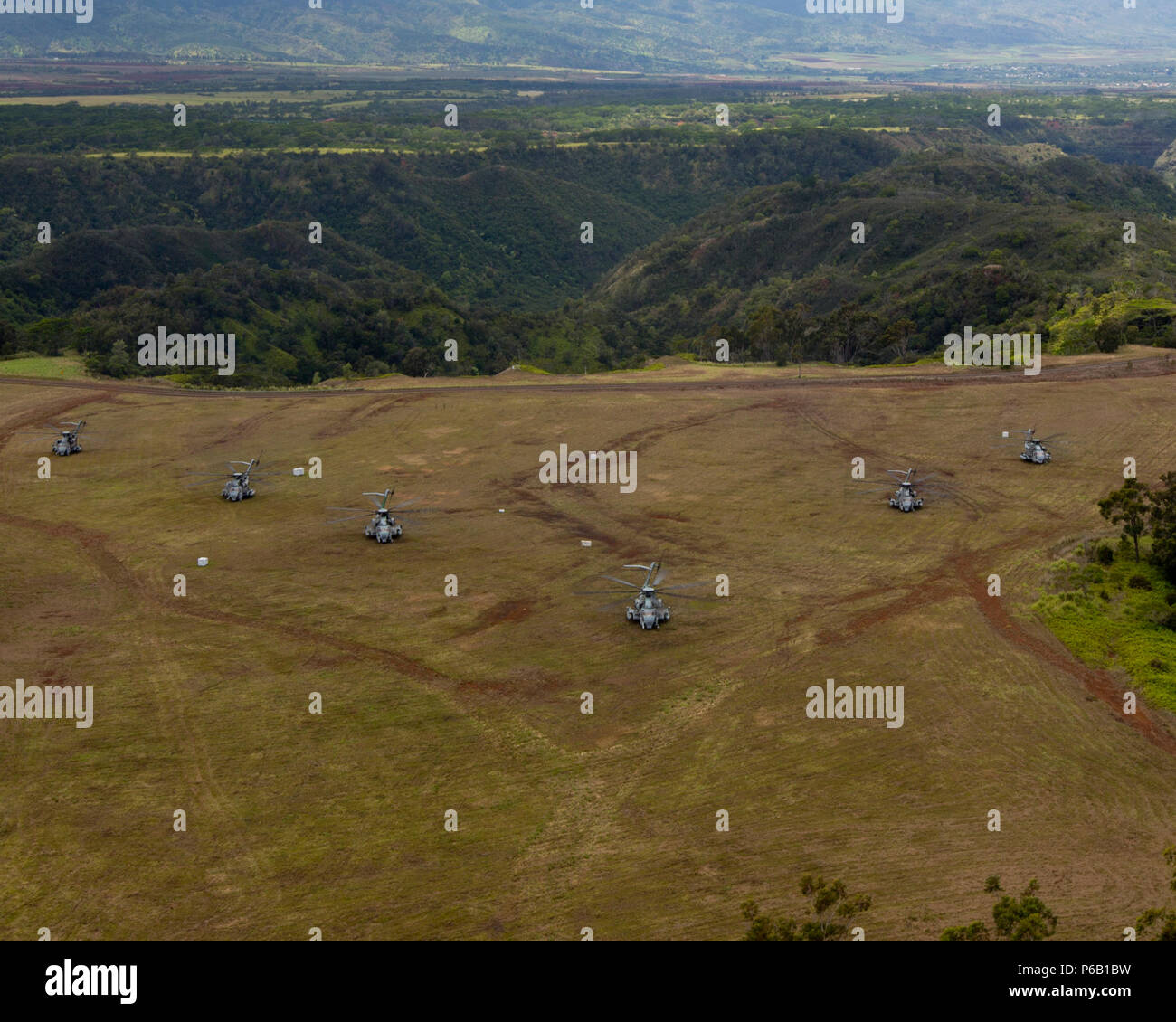 U.S. Marine Heavy Helicopter Squadron 463 (HMH-463) flies over the ...