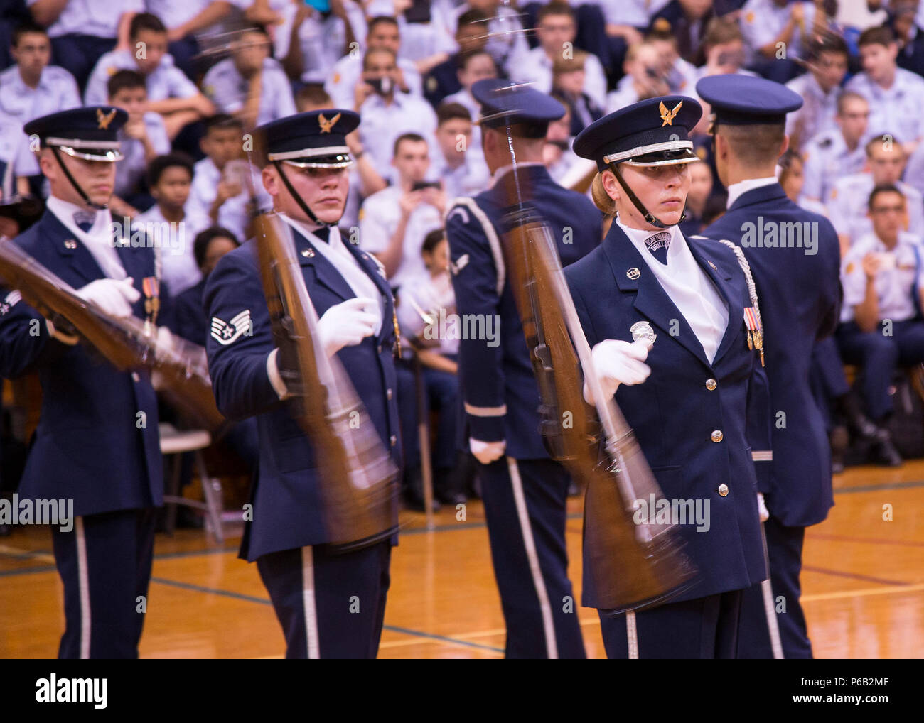 Members of the U.S. Air Force Honor Guard Drill team spin their M-1 ...