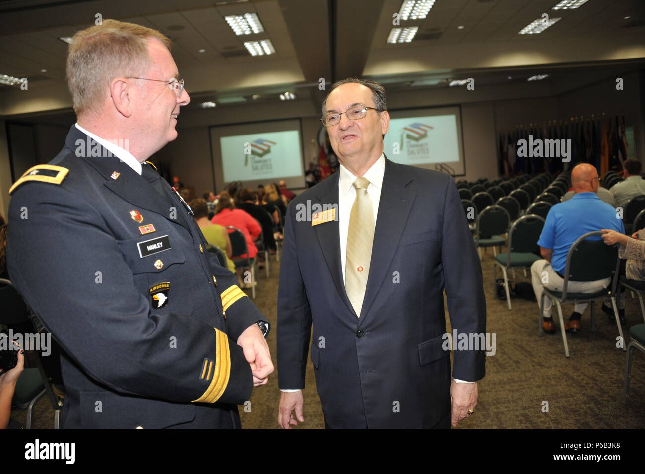 Retired U.S. Army Brigadier General John Hanley, left, chats with ...