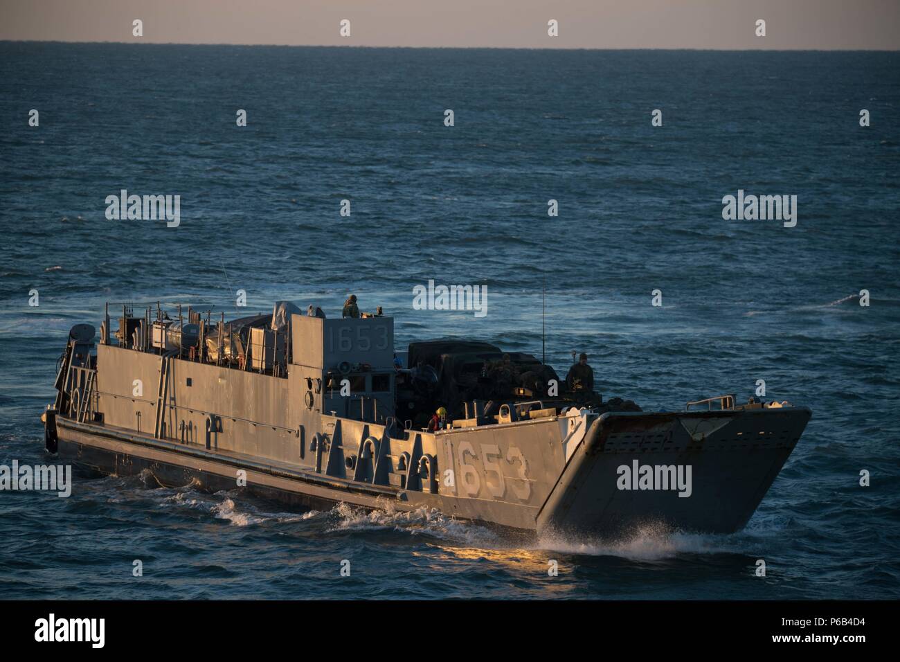161202-N-AV754-030 ATLANTIC OCEAN (Dec. 2, 2016) A landing craft ...
