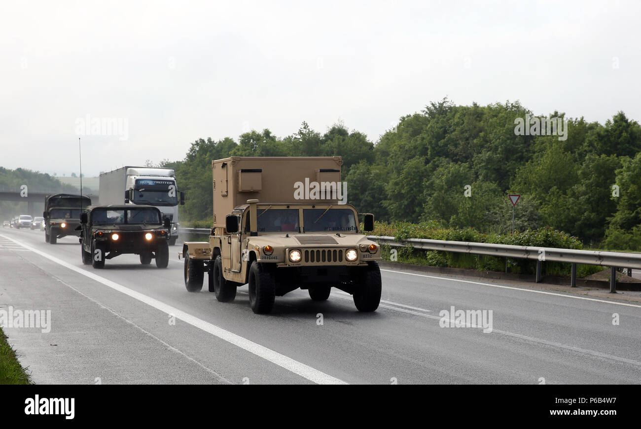 A U.S. Army convoy from Bravo Company, 44th Expeditionary Signal Battalion, 2nd Signal Brigade ...