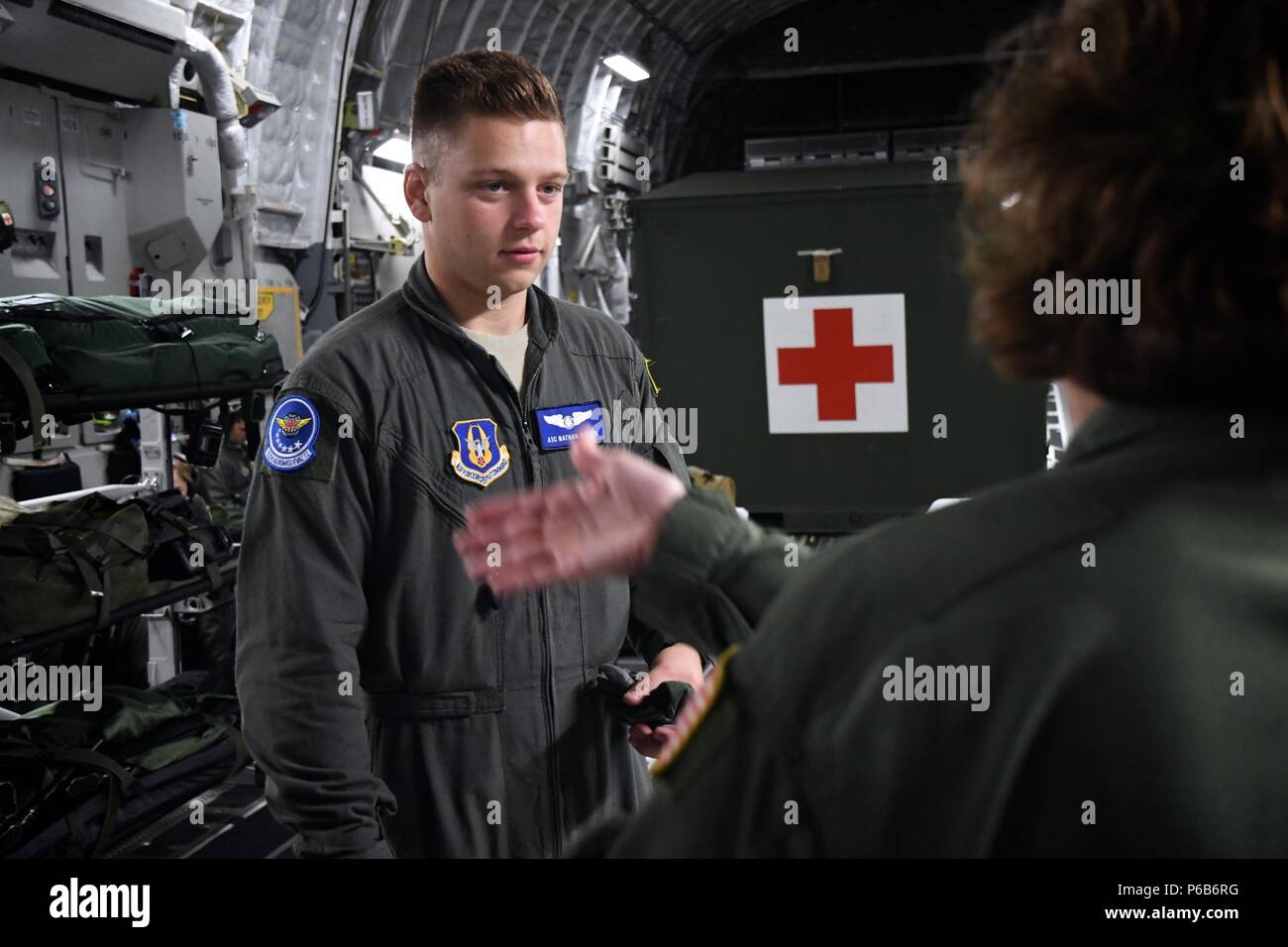 Airman 1st Class Nathan Boyer listens to instructions as the 932nd ...
