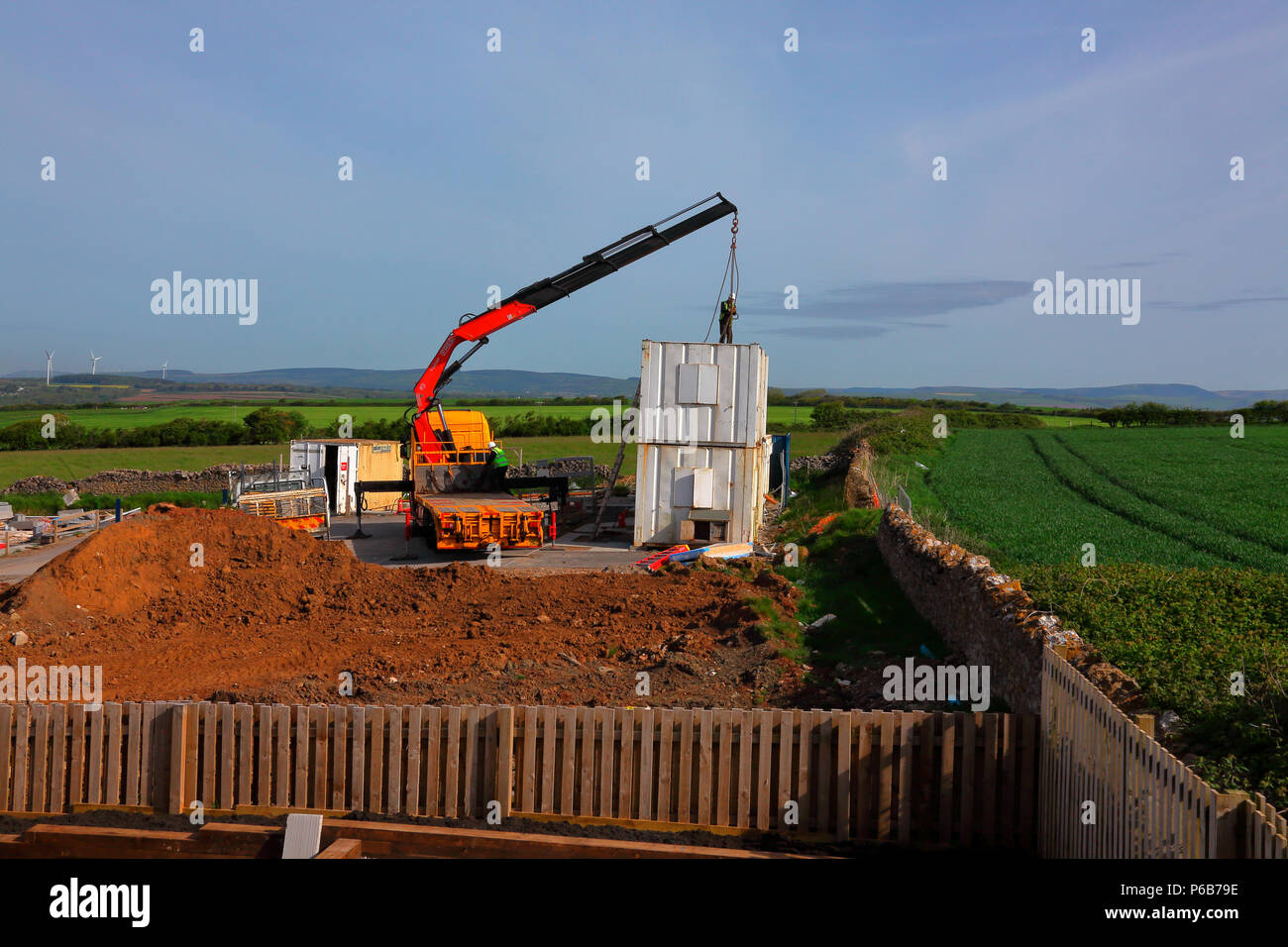 Removal day and the container office is chained up and hoisted aboard ...