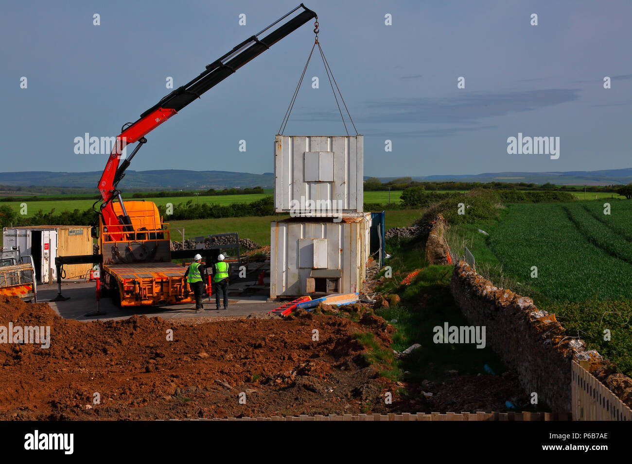 Removal day and the container office is chained up and hoisted aboard ...