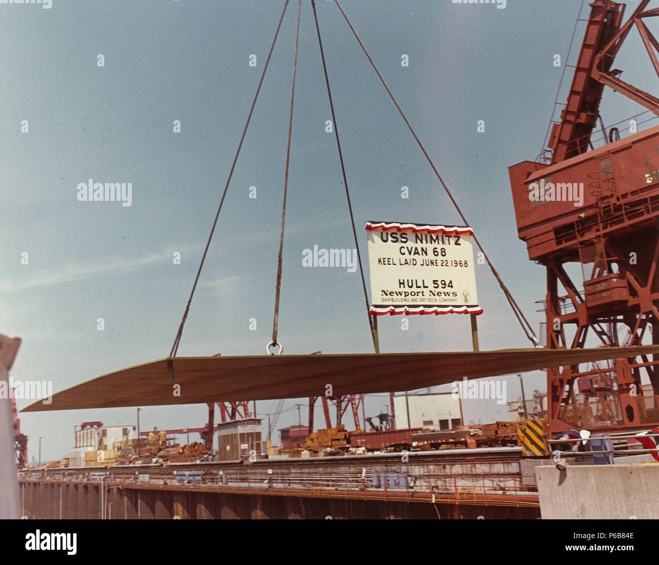 The keel of the Nimitz is lowered into the shipyard dock in Norfolk on ...