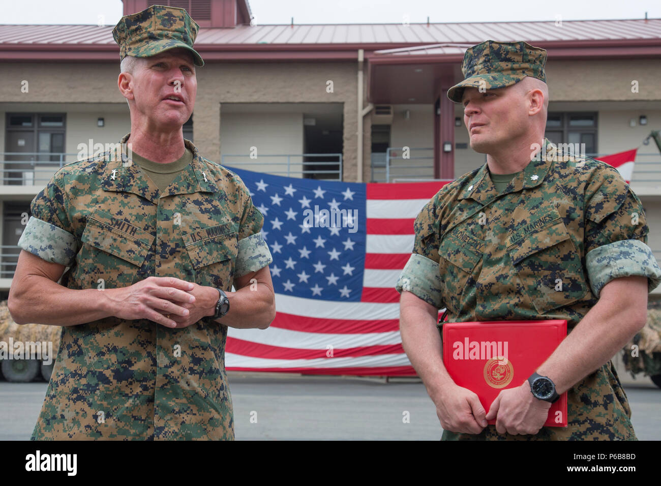 U.S. Marine Corps Maj. Gen. Eric M. Smith, left, the commanding general ...