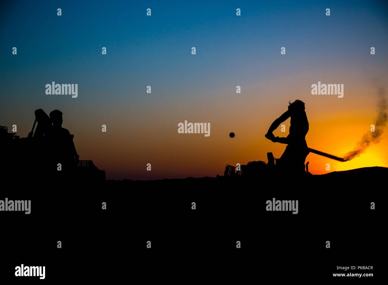 U.S. Army Sgt. Peter Scaion, 3rd Cavalry Regiment, swings an improvised ...
