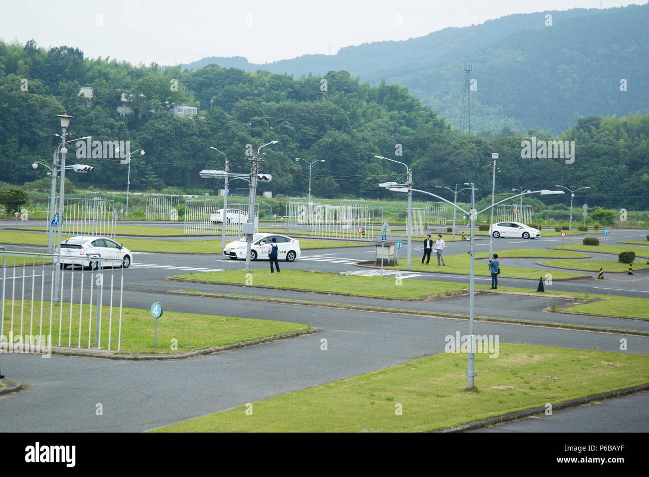 U.S. service members drive on an Iwakuni Driving School course in ...