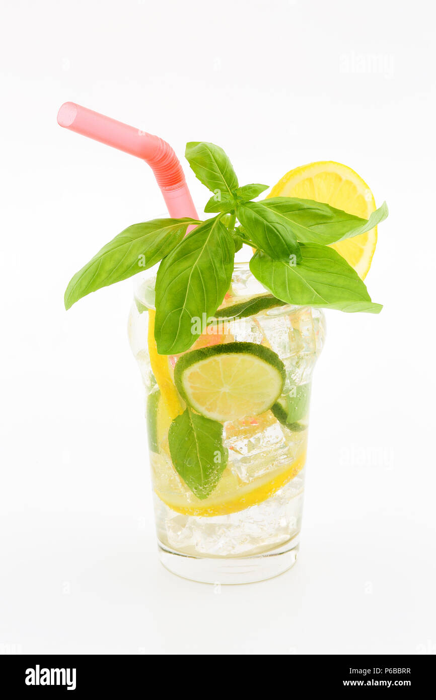 Fresh summer fizzy cooler cocktail with lemon and limette wheels, ice ...