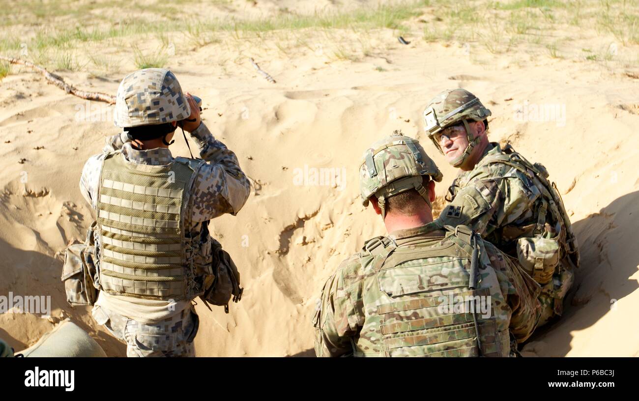 U.S. Army Brig. Gen. James J. Mingus (right), the deputy commanding ...