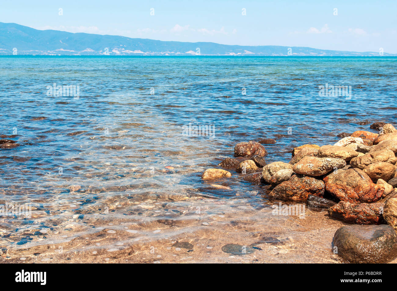 Sea shore stone wave background Stock Photo - Alamy