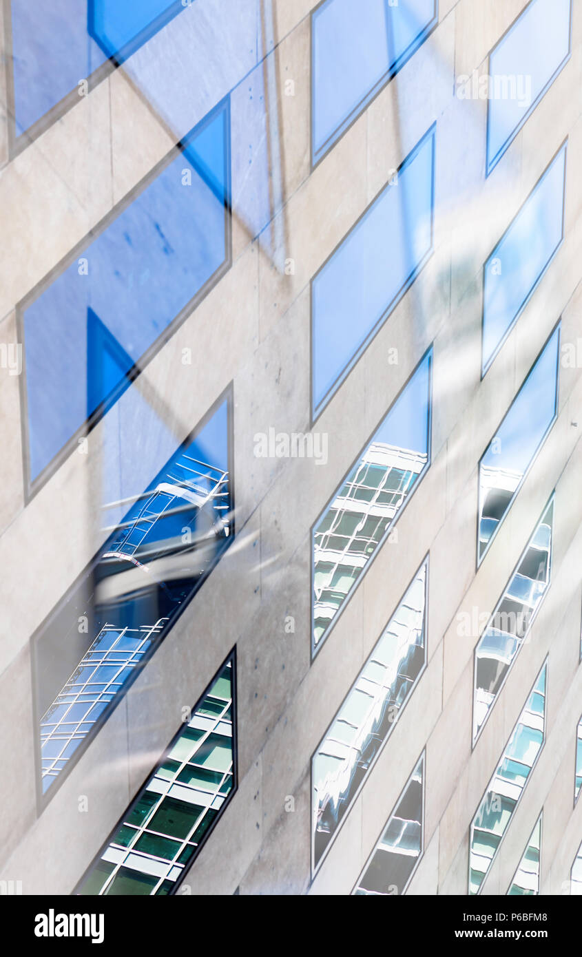 Double exposure architectural abstract. Detail of windows and ...