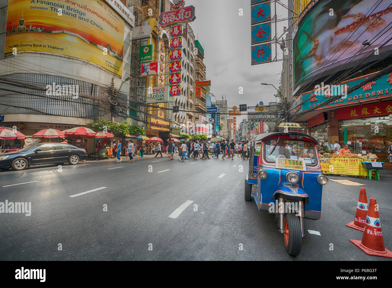 A view of the traffic in a street of Chinatown Stock Photo - Alamy