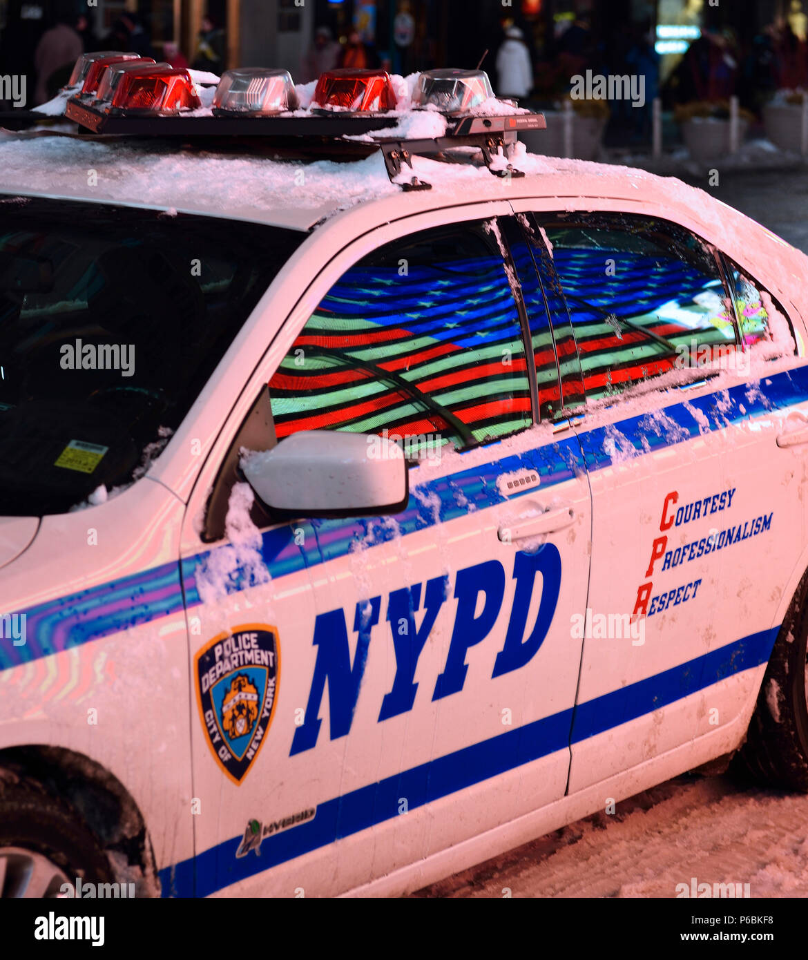 USA, New York, a reflection of the stars and stripes on the windows of ...