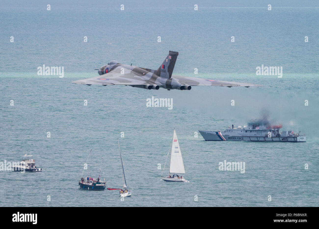 Avro Vulcan B2 (XH558) and Border Force ship "HMC Searcher Stock Photo ...