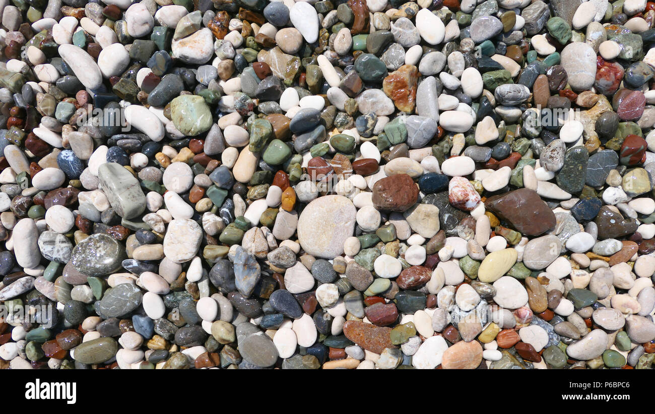 Sea stones background Stock Photo - Alamy