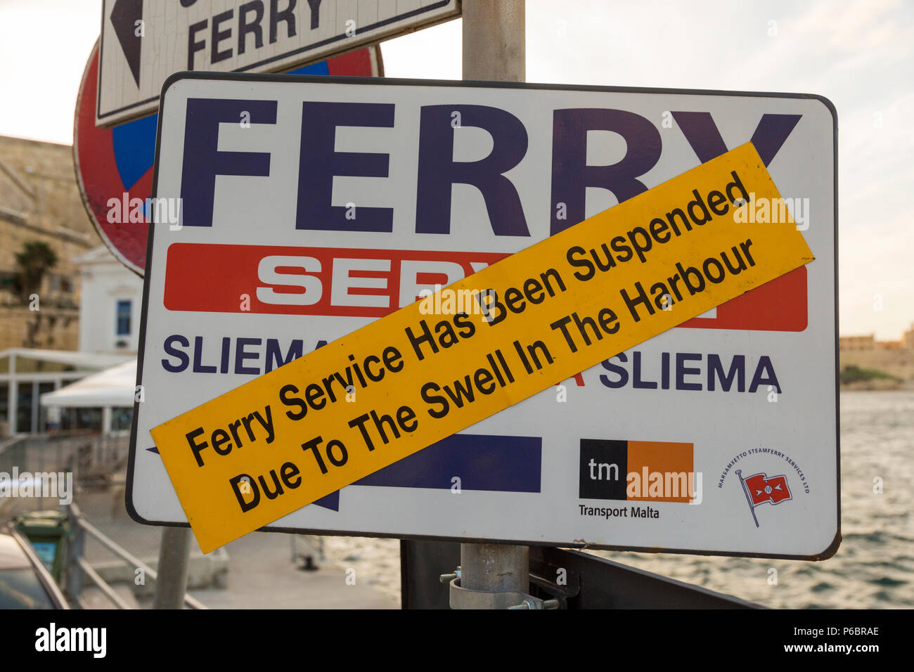 Ferry boat suspended service sign at the Valletta to Sliema ferry stop ...