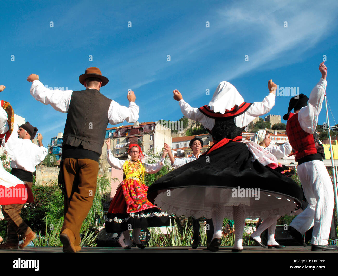 PORTUGAL, Lisboa, young men and women wearing traditional clothes are ...