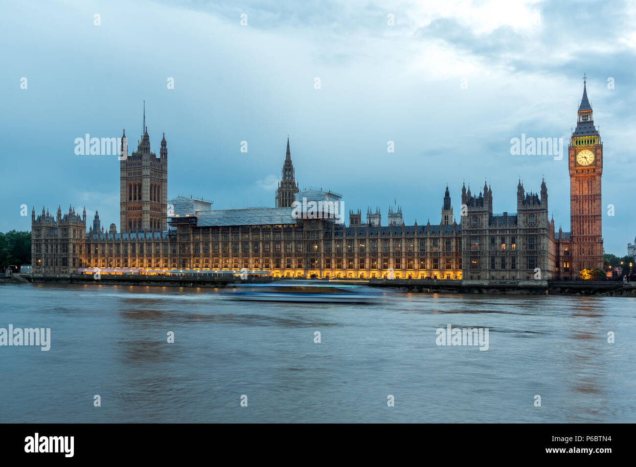 LONDON, ENGLAND - JUNE 16 2016: Sunset view of Houses of Parliament ...