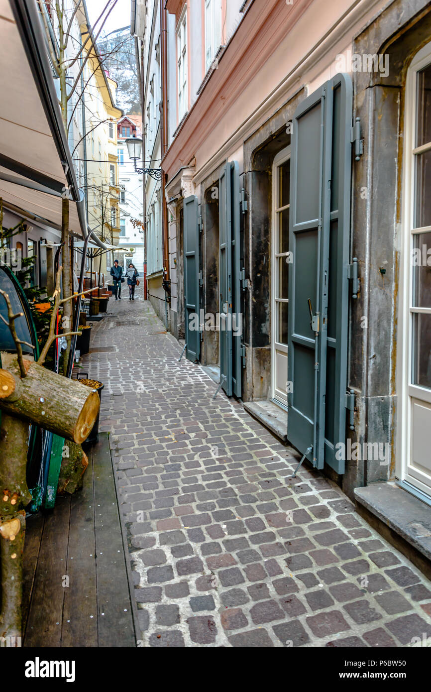 View narrow cobblestone street in hi-res stock photography and images ...