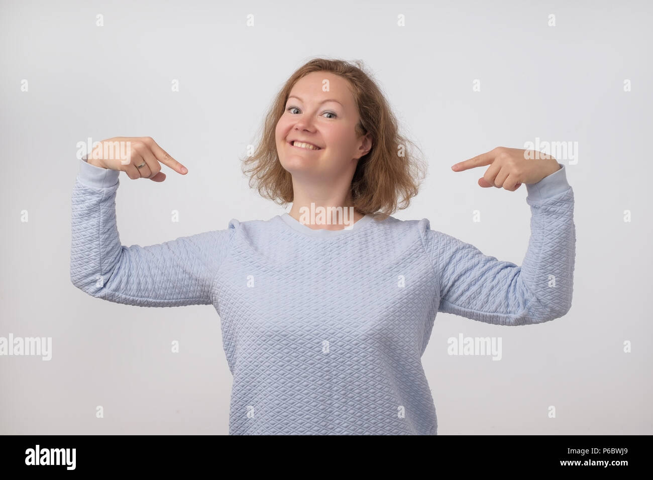 Pretty european girl proud of herself. She is proud for her exam ...