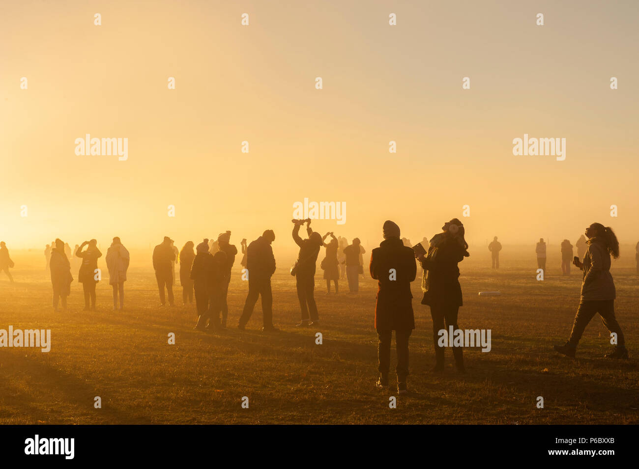 Crowd Looking Up At The Sky