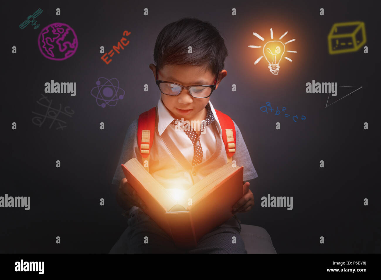 Back to school, Child opened a magic book, Image dark tone Stock Photo ...