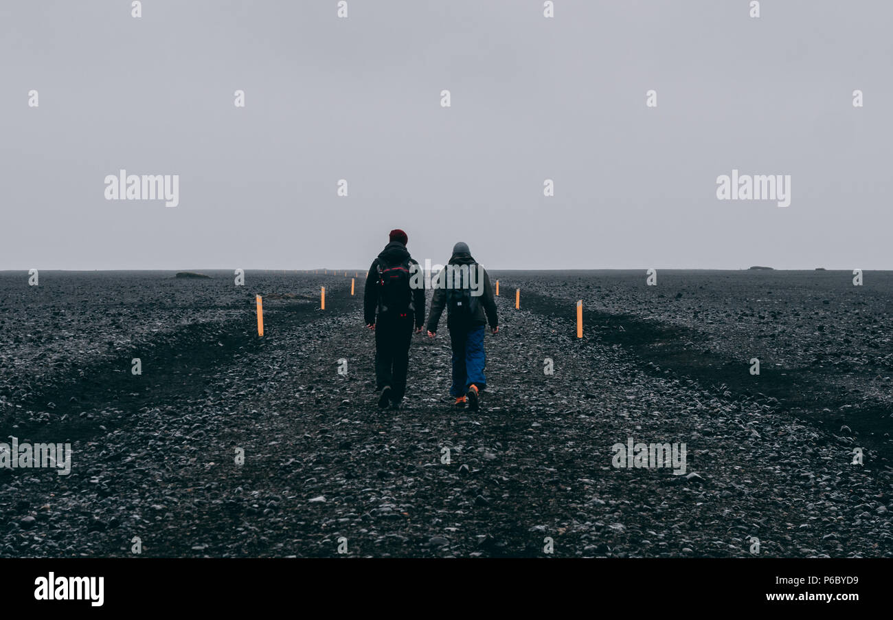 Two guys walking hi-res stock photography and images - Alamy