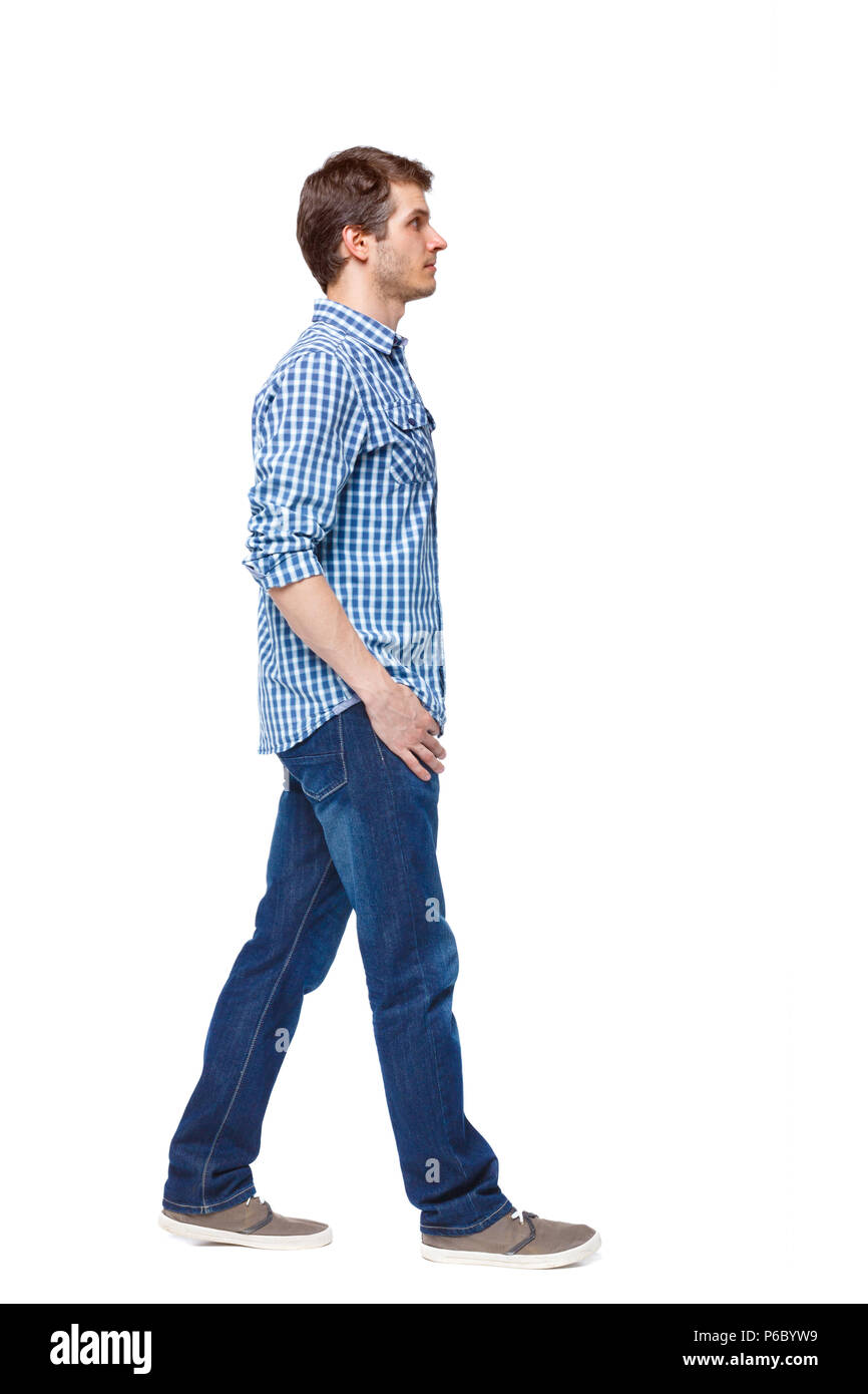Side view of going handsome man. walking young guy . Rear view people ...
