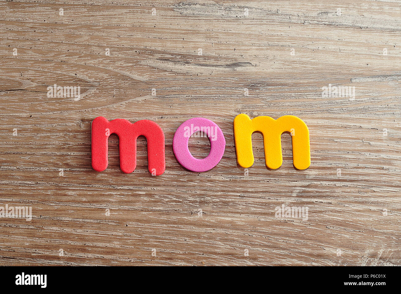 Mom spelled with colorful letters Stock Photo - Alamy