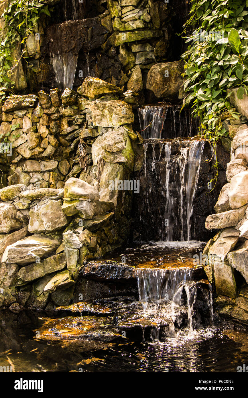 A small rocky waterfall place Stock Photo - Alamy
