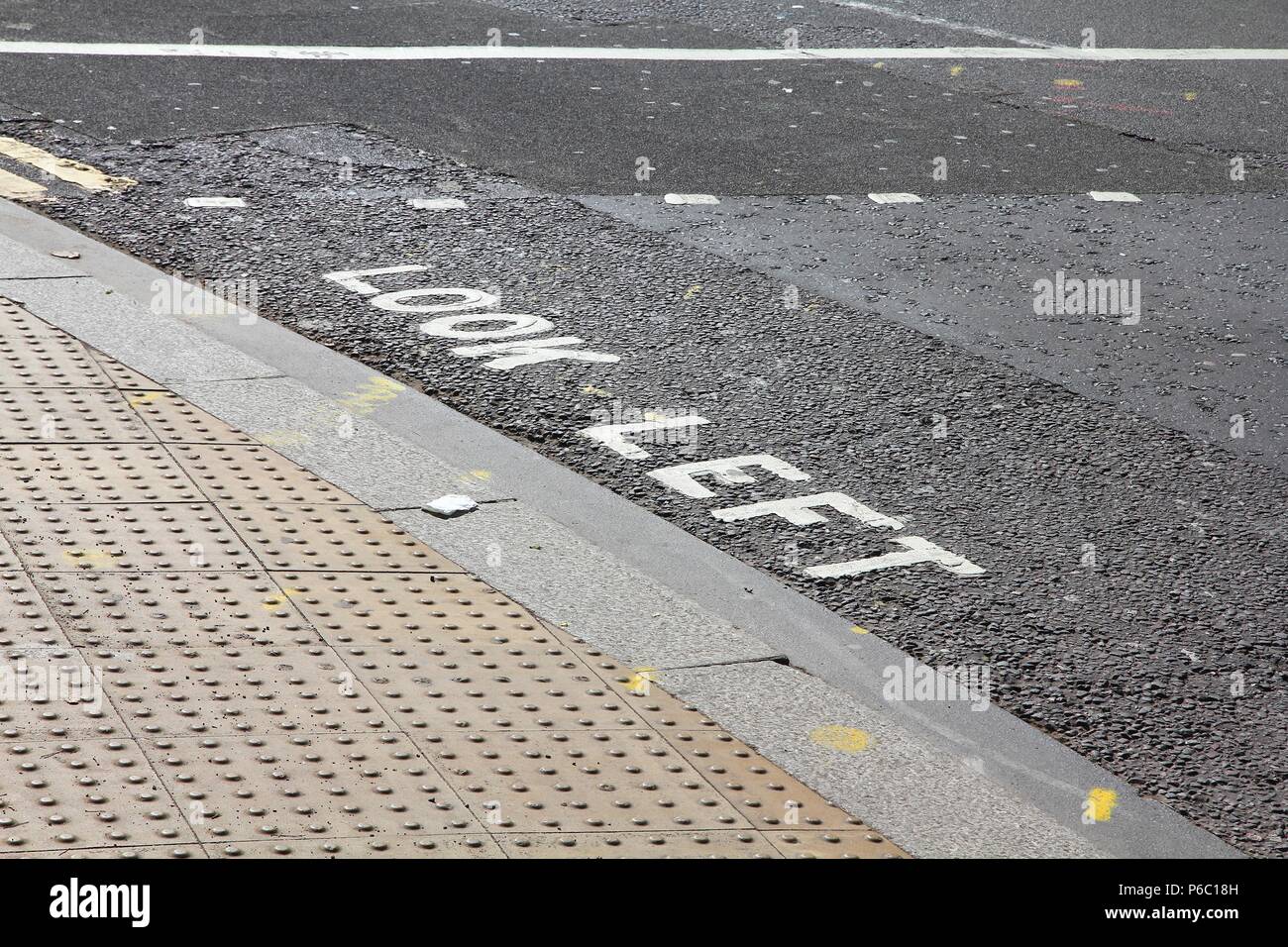 Pedestrian crossing look left sign hi-res stock photography and images ...