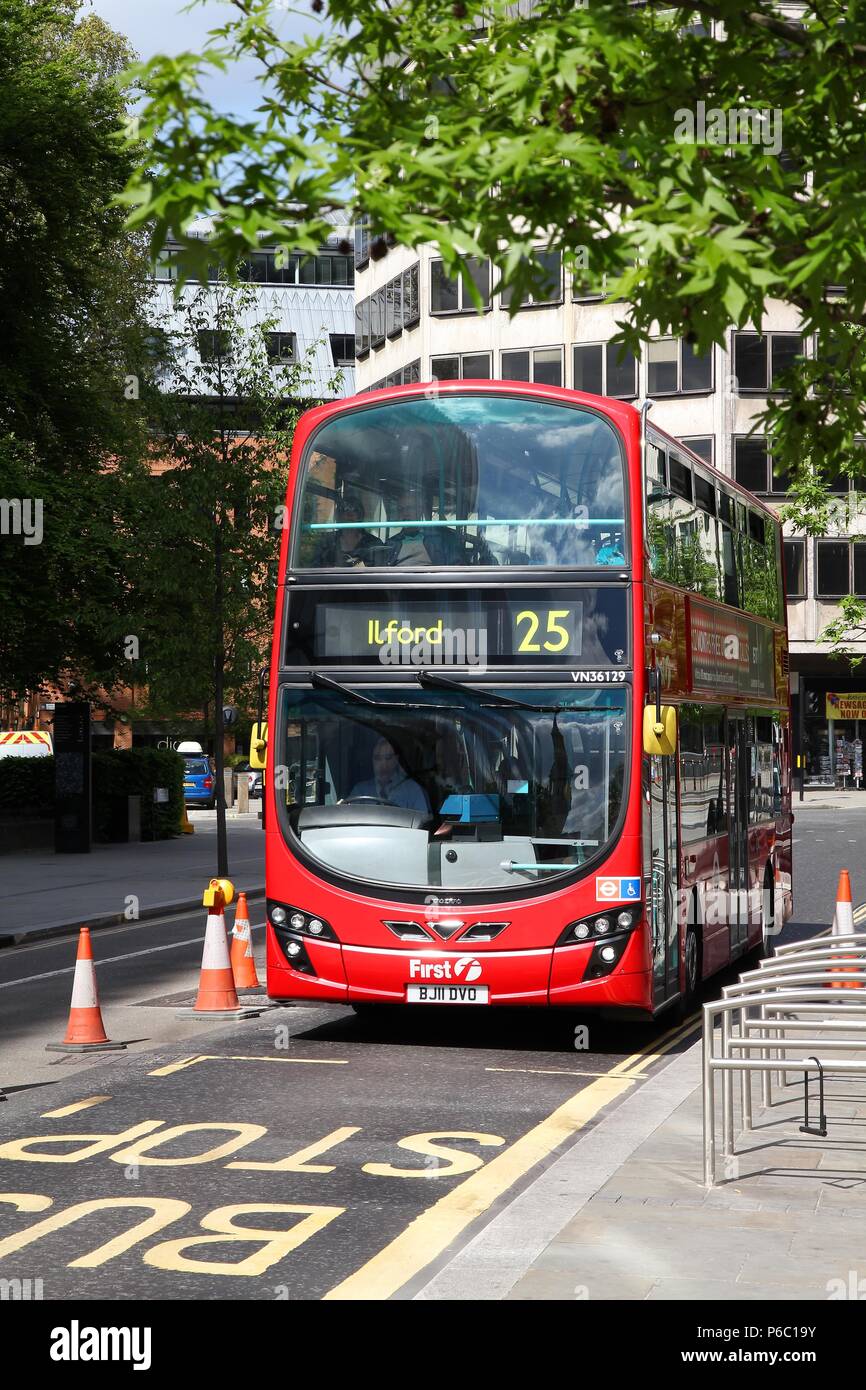 LONDON - MAY 13: People ride London Bus on May 13, 2012 in London. As ...