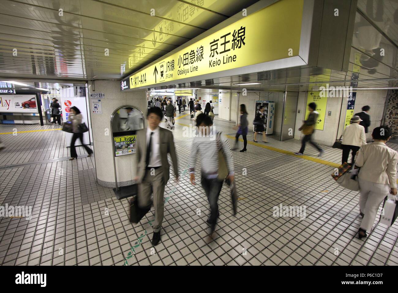 TOKYO, JAPAN - MAY 11, 2012: People walk at Tokyo Metro Marunouchi Line ...