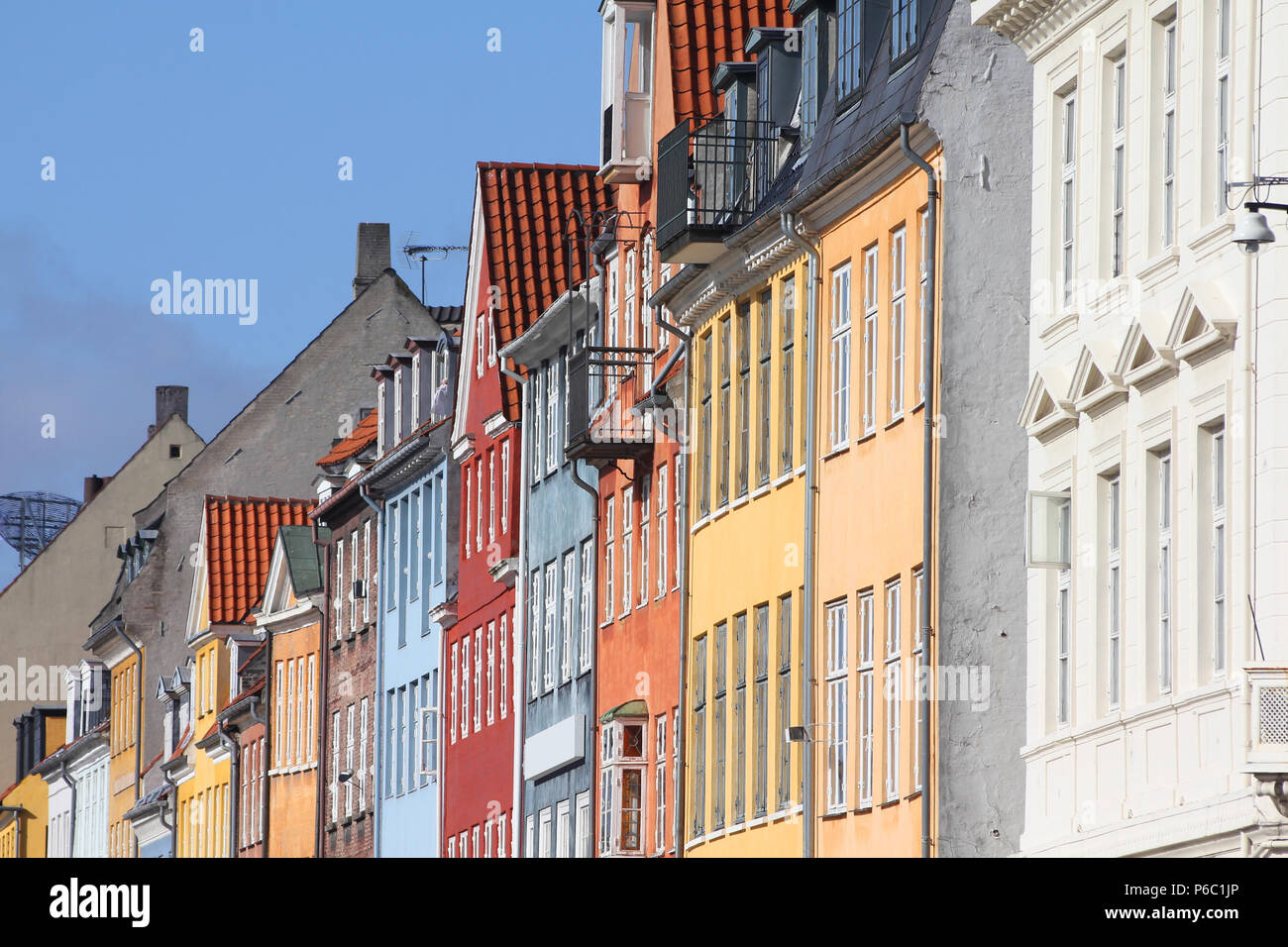 Copenhagen, Denmark - colorful buildings of Nyhavn street. Oresund ...