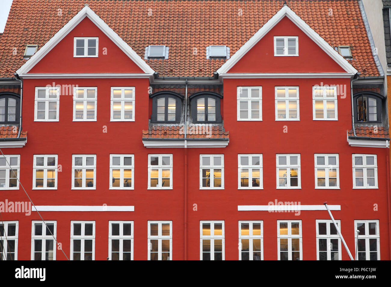 Copenhagen, Denmark - red building of Nyhavn street. Oresund region ...